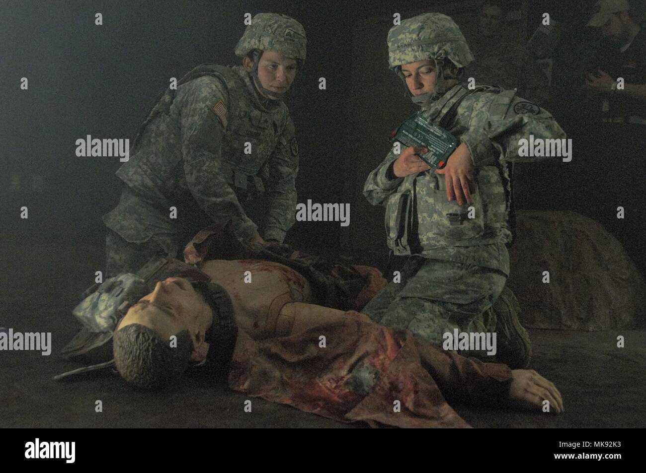 Assessing injury hi-res stock photography and images - Alamy