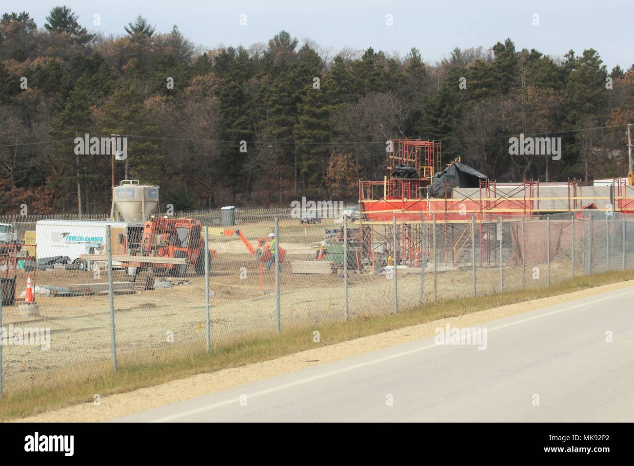 Workers with Catamount Constructors, Inc. of Lakewood, Colo., continue ...