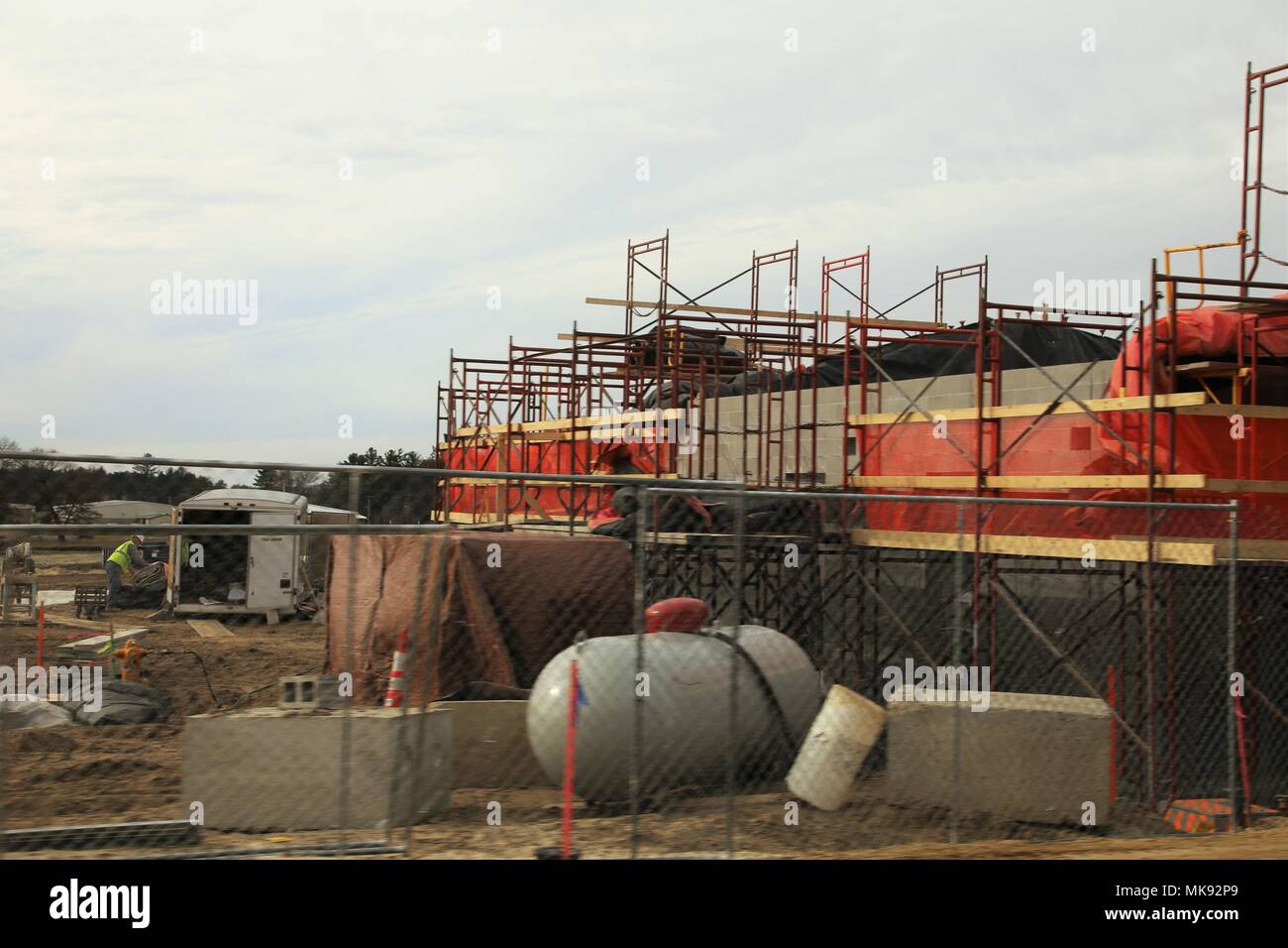 Workers with Catamount Constructors, Inc. of Lakewood, Colo., continue ...