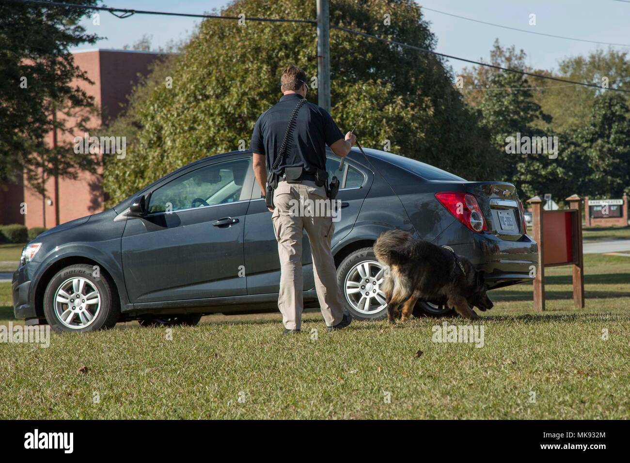 Officer Jared L. Hege, dog handler, Provost Marshal Office ...