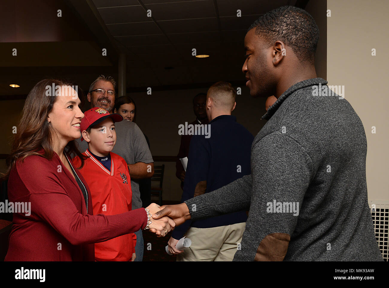 April Griffin and her family greet U.S. Army Soldiers they “adopted ...