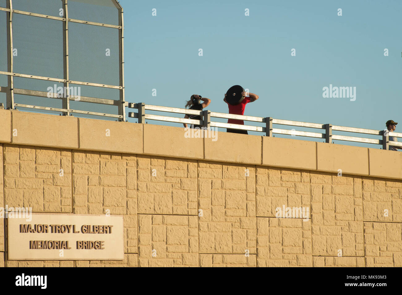 Team Luke Thunderbolts carry weights over the Troy Gilbert Memorial ...