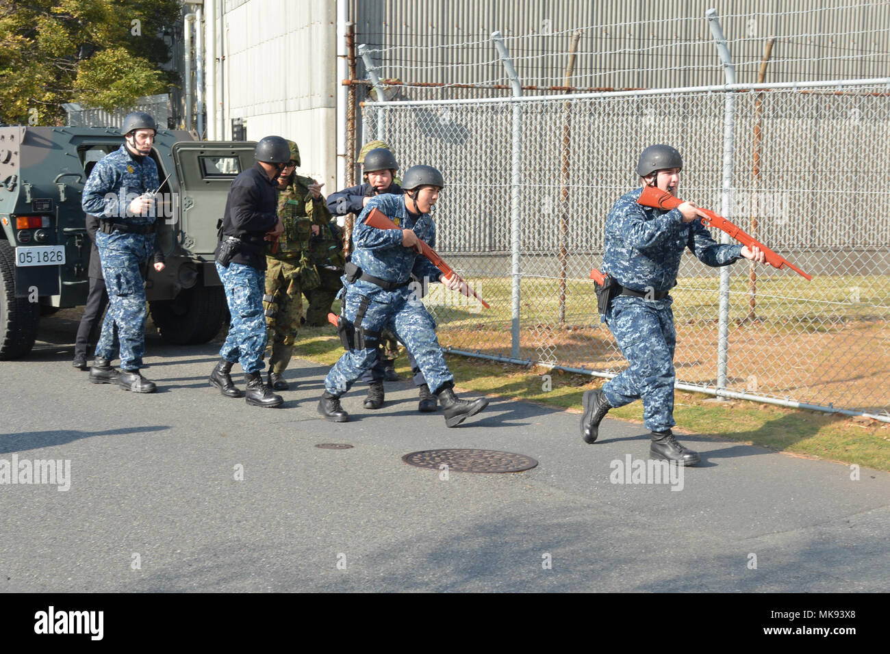 171129-N-XN177-083 YOKOSUKA, Japan – Sailors and members of the ...
