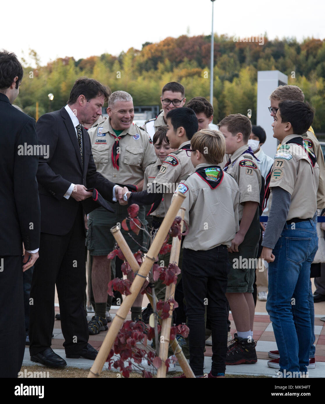 Ambassador William Hagerty, U.S. ambassador to Japan, shakes the hand ...