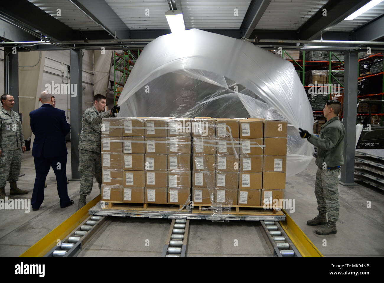 Airmen 1st Class Matthew Moneymaker-Grizzle and Ryan Chamberlain, 436th ...