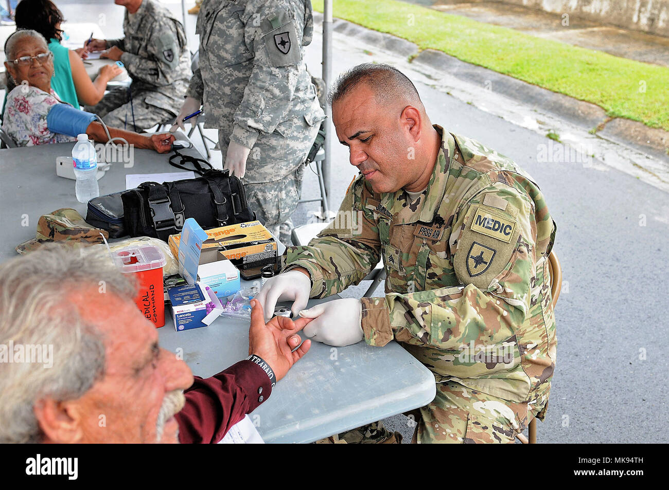 Citizen-Soldiers of the Puerto Rico Army National Guard and members of ...
