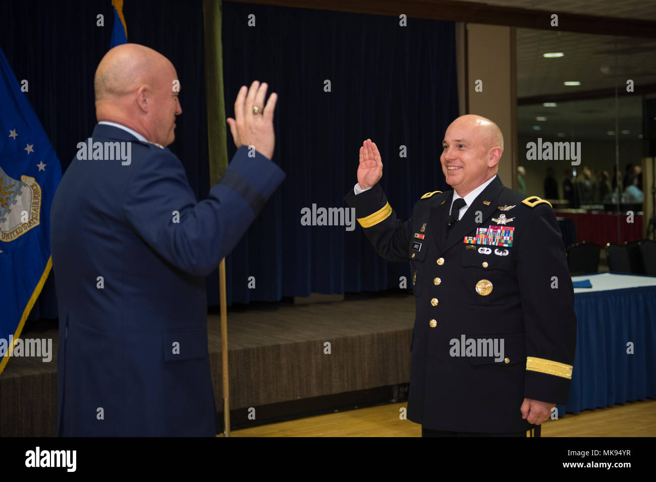 U.S. Air Force Gen. Jay Raymond (left), commander of Air Force Space ...