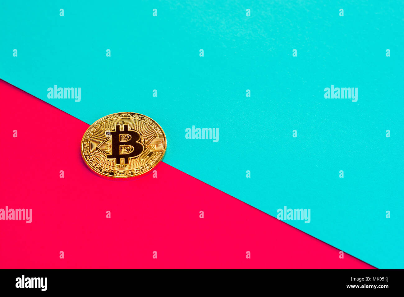 Bitcoin on colorful paper background with copy space Stock Photo - Alamy