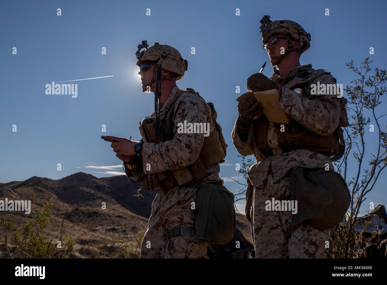 U.S. Marines 2nd Lt. John Donovan and Cpl. Tanner Reihm establish ...