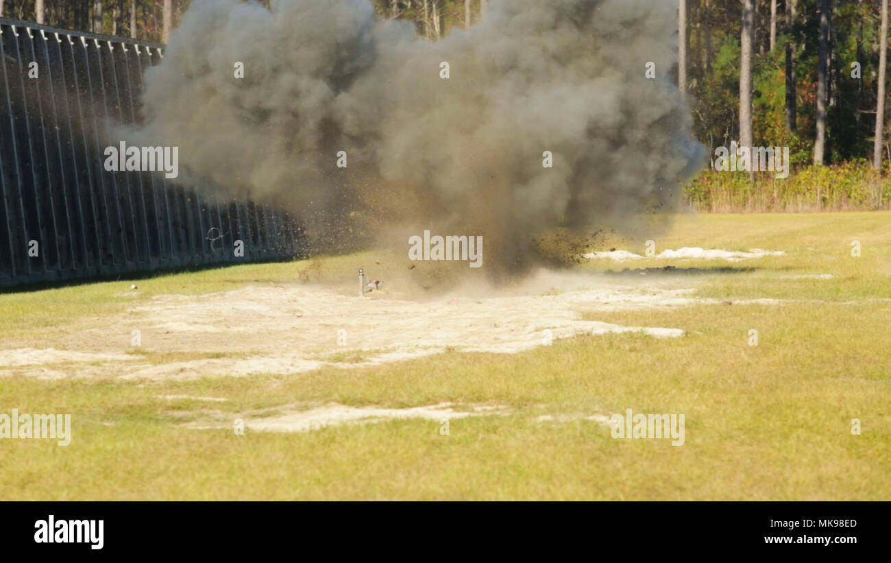A 60mm mortar round detonates during a low-order demolition at Camp ...