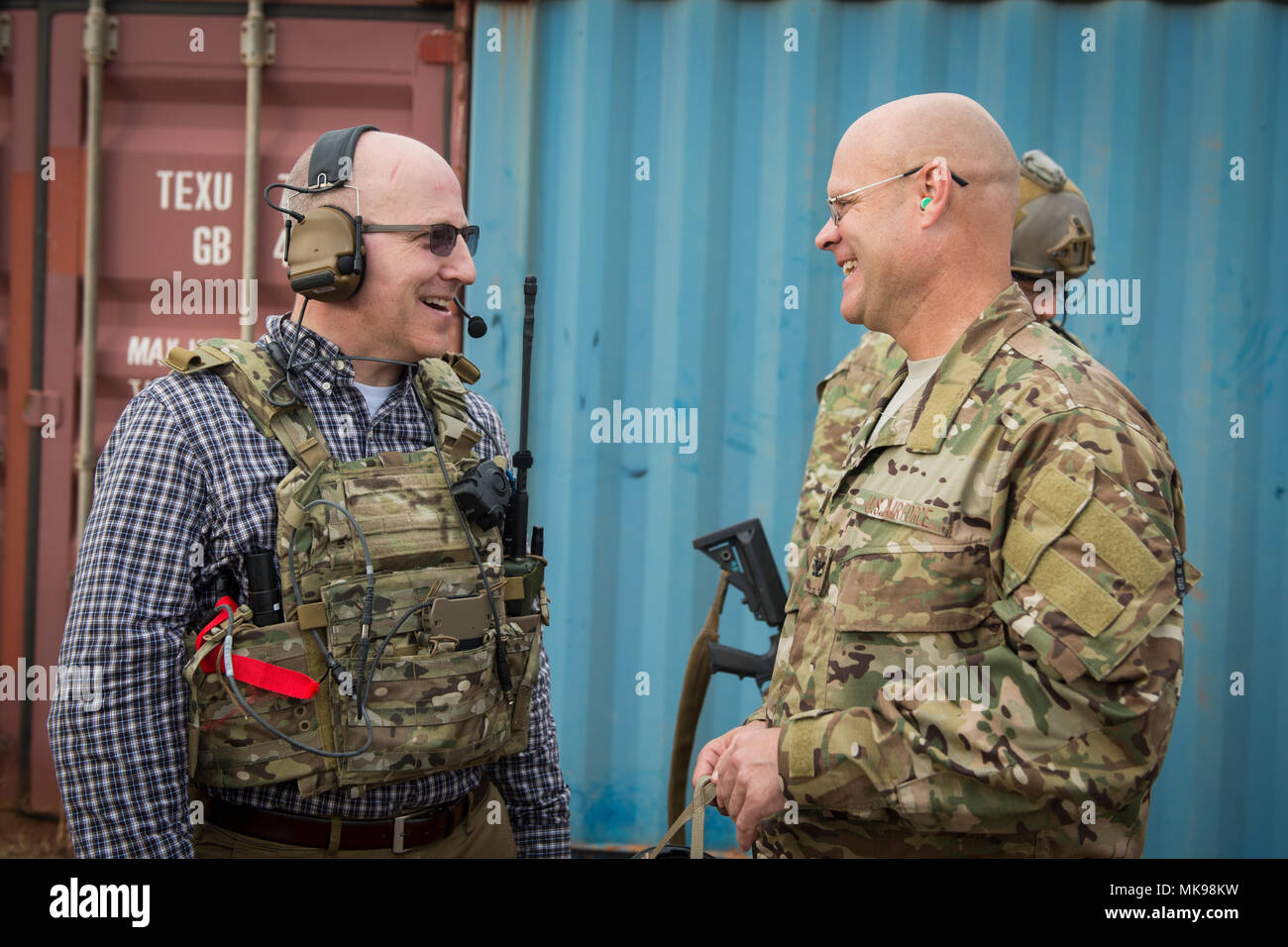 Mark. E. Mitchell, left, Acting Assistant Secretary of Defense (Special ...
