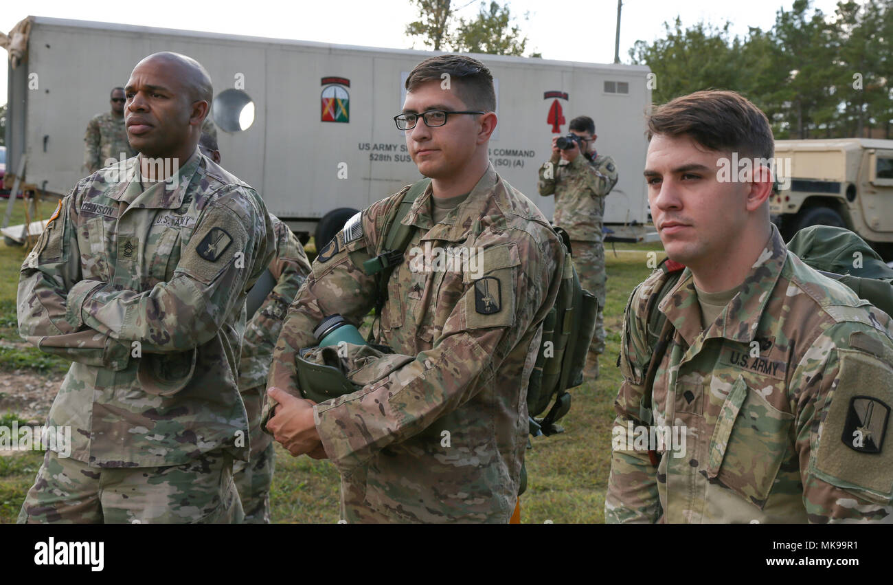 U.S. Army Master Sgt. Endesha Johnson, Sgt. Paul Sale, and Spc ...