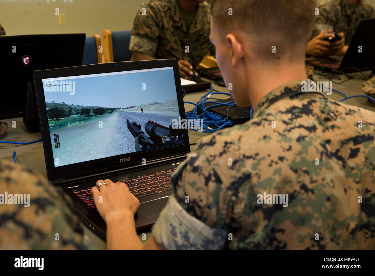 U.S. Marines with 3rd Marine Regiment demonstrate how to use a Tactical ...