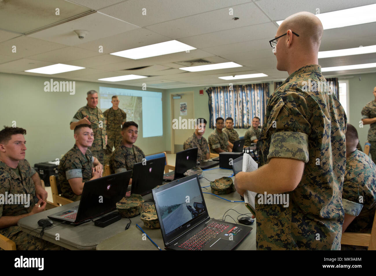 U.S. Marine Corps Lance Cpl. Braydon Dial, right, infantry rifleman ...