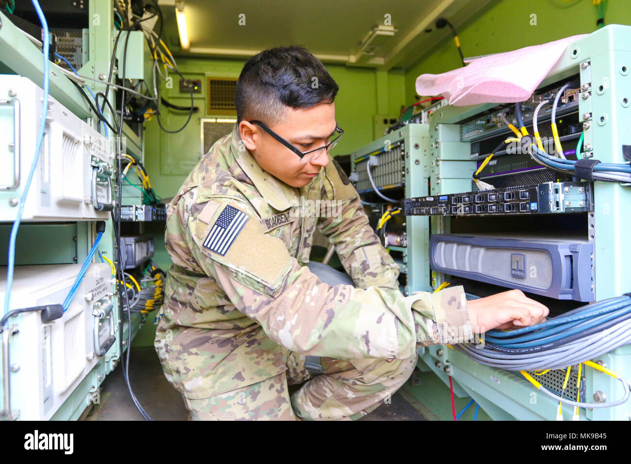 Pfc. Jonathan Broadbent, a nodal network systems operator/maintainer ...