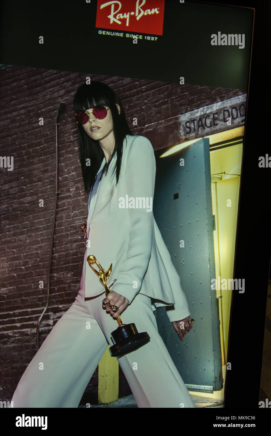 Pretty girl with sunglasses Ray Ban with reflection Stock Photo - Alamy