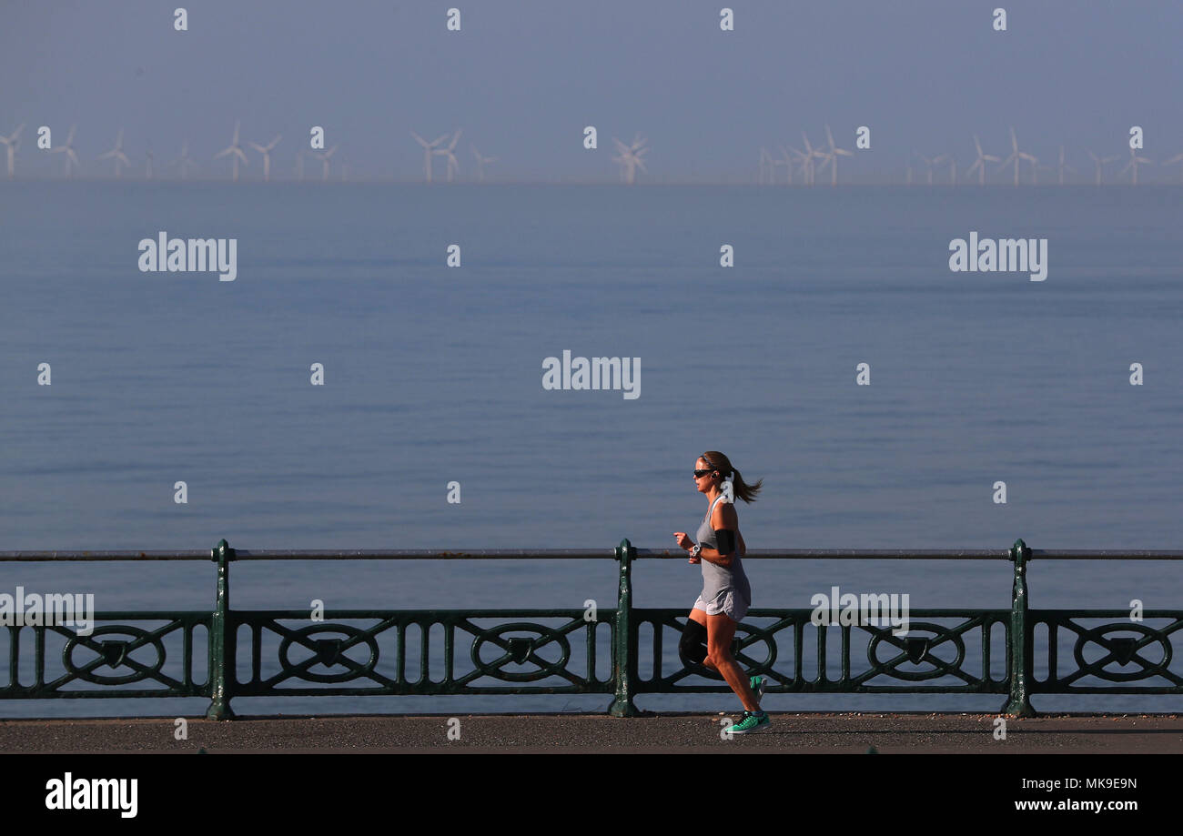 A jogger on brighton seafront hi-res stock photography and images - Alamy