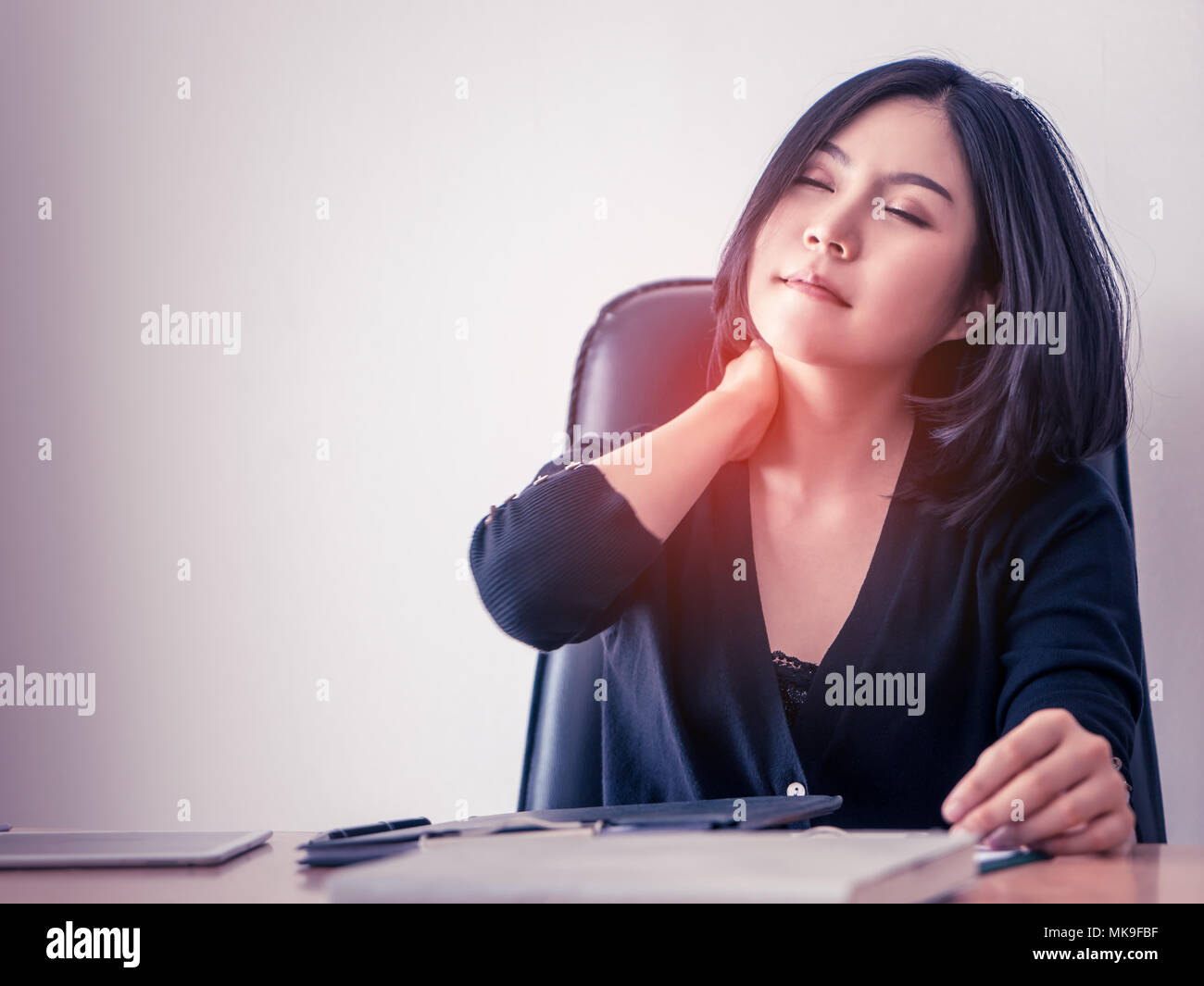 Office worker having injury on her shoulder from office health problem ...