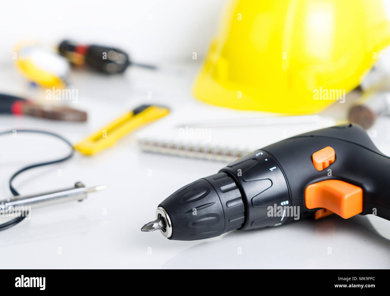 Repair man, construction worker tools on white background. Focus on ...