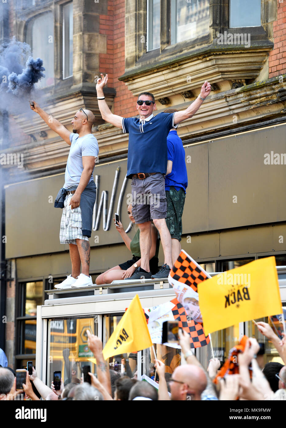 Supporters let off flares and wave flags ahead of the winner's parade ...