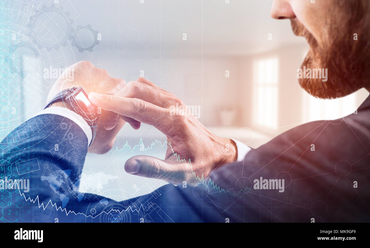 Young man using smartwatch hi-res stock photography and images - Alamy