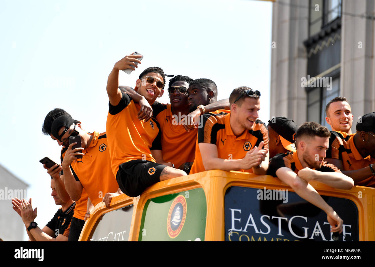 Open top bus makes its way round hi-res stock photography and images ...