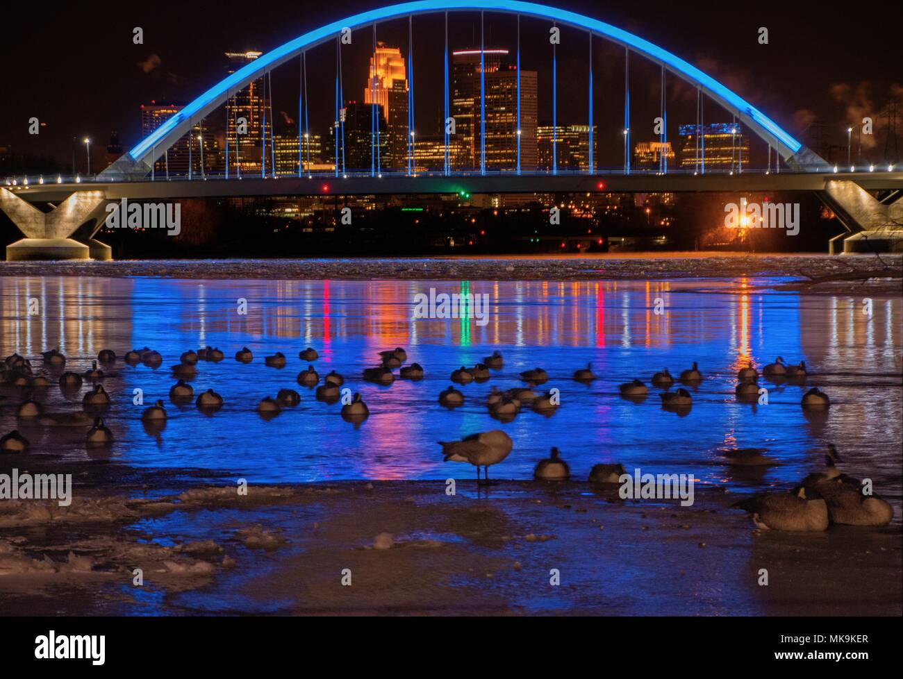 Lowry Bridge colored blue with Minneapolis Skyline behind Stock Photo ...