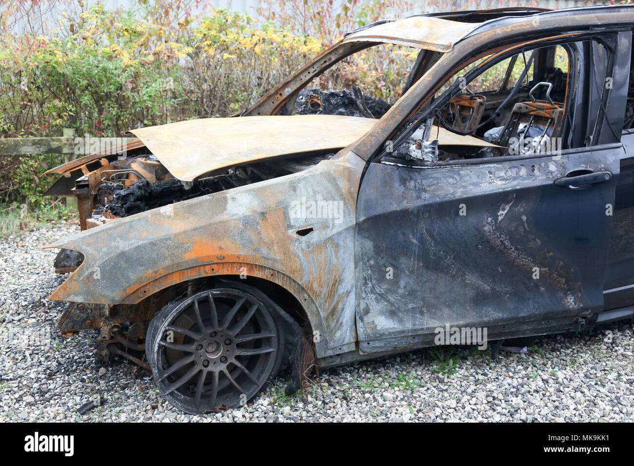 Rusty burnt out wreck hi-res stock photography and images - Alamy