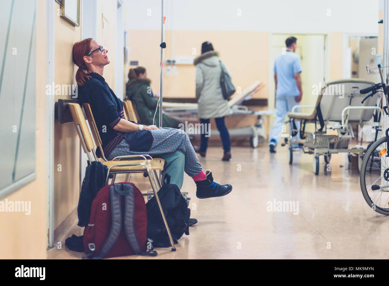 Person in wheel chair bed hi-res stock photography and images - Alamy