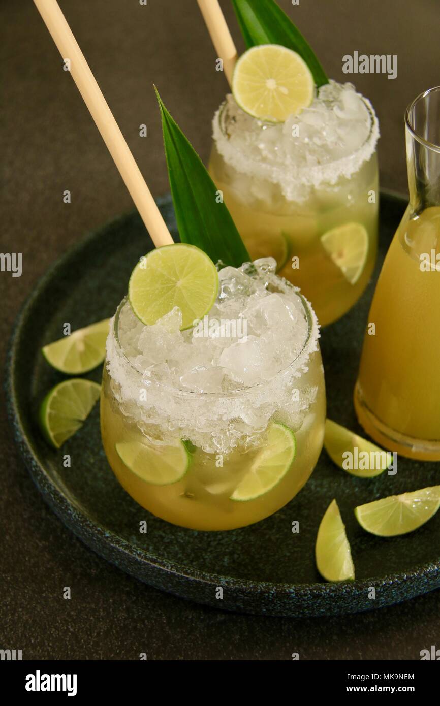 Mocktail of sugar cane, coconut water and lime Stock Photo - Alamy