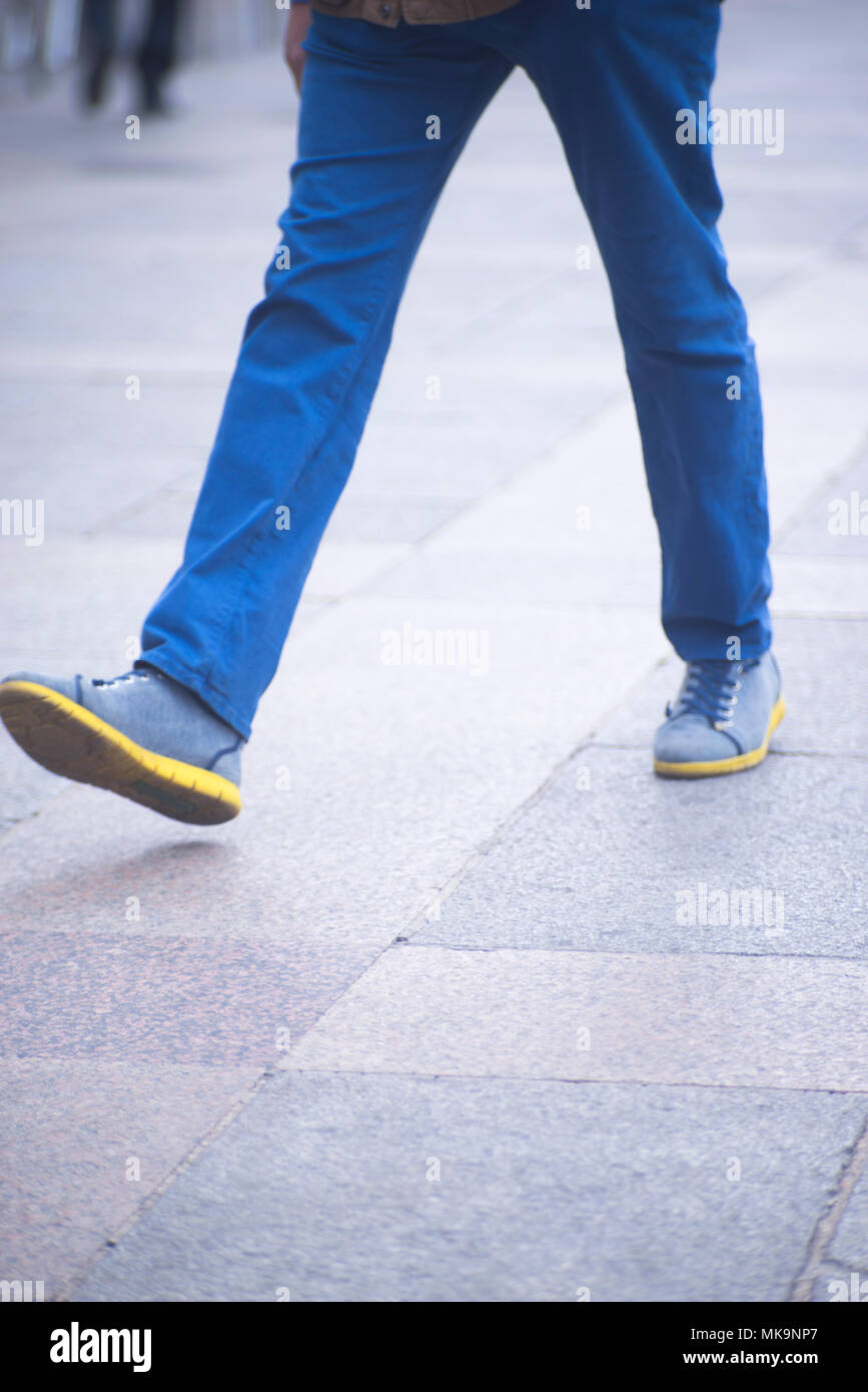 People walking in busy urban city shopping street sidewalk pavement ...