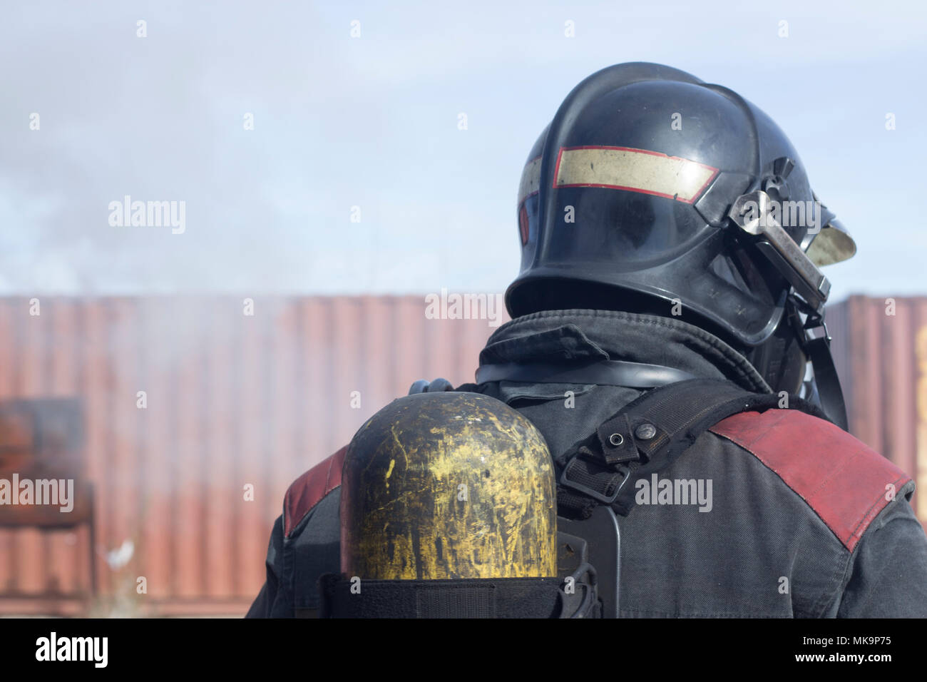 Firefighter putting out fire training station extinguisher backdraft ...
