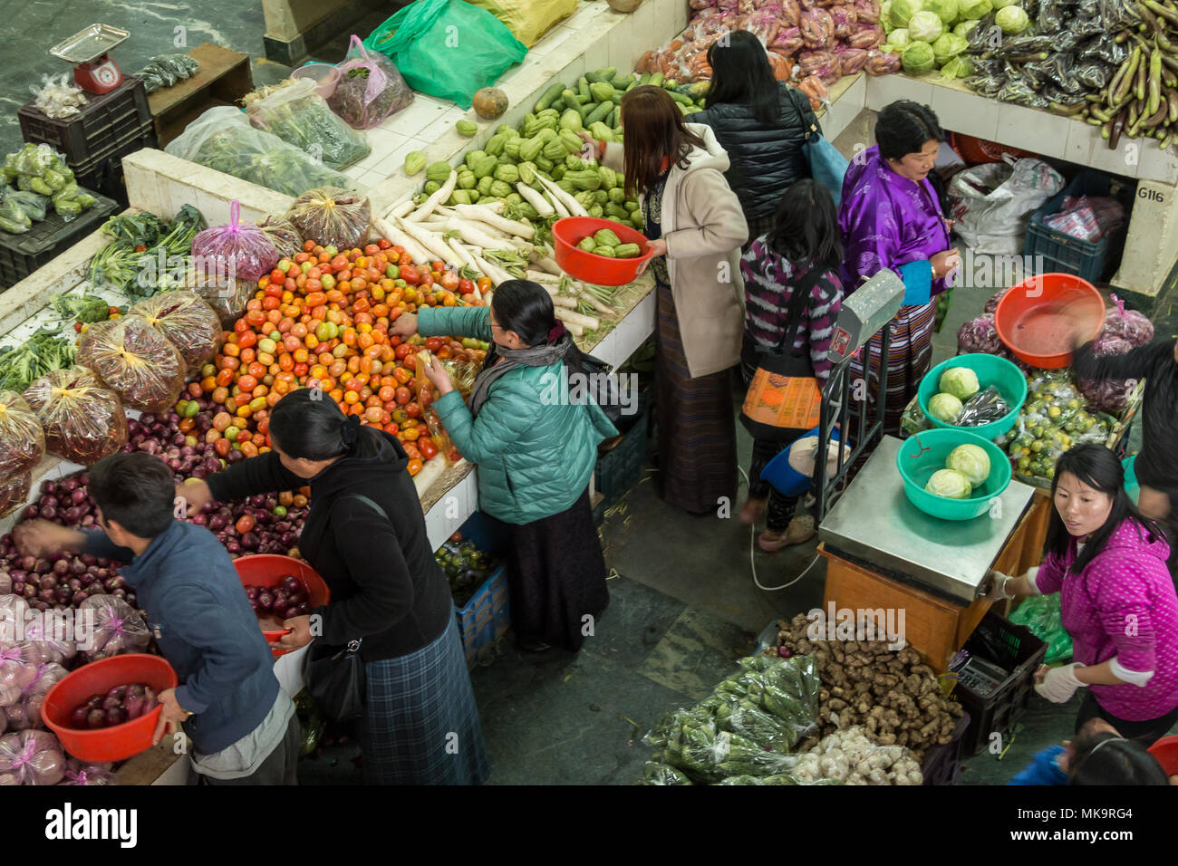 Local people and tourists shopping at the fruit and vegetable market in ...