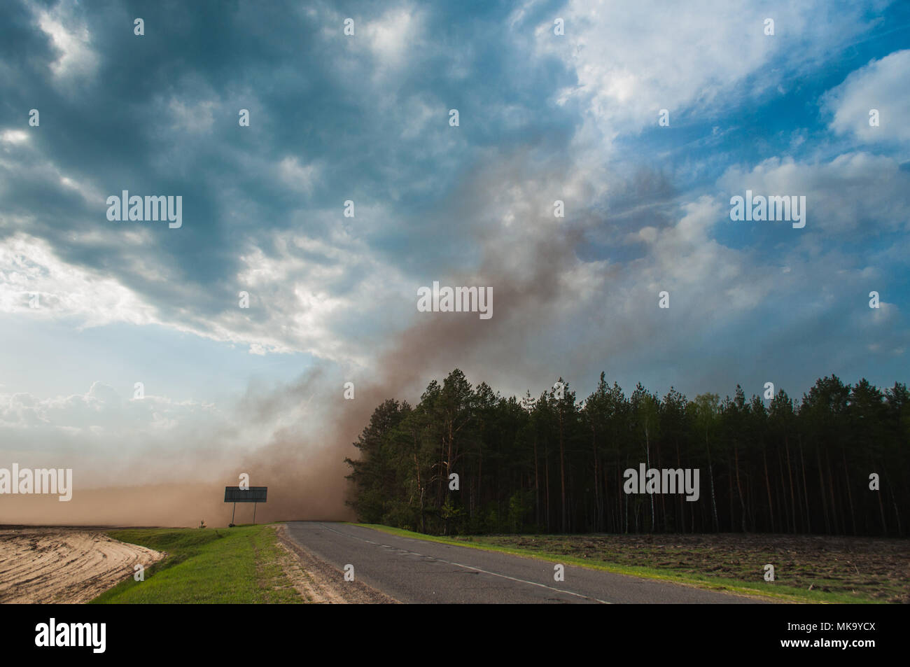 Desert road in a sand storm hi-res stock photography and images - Alamy