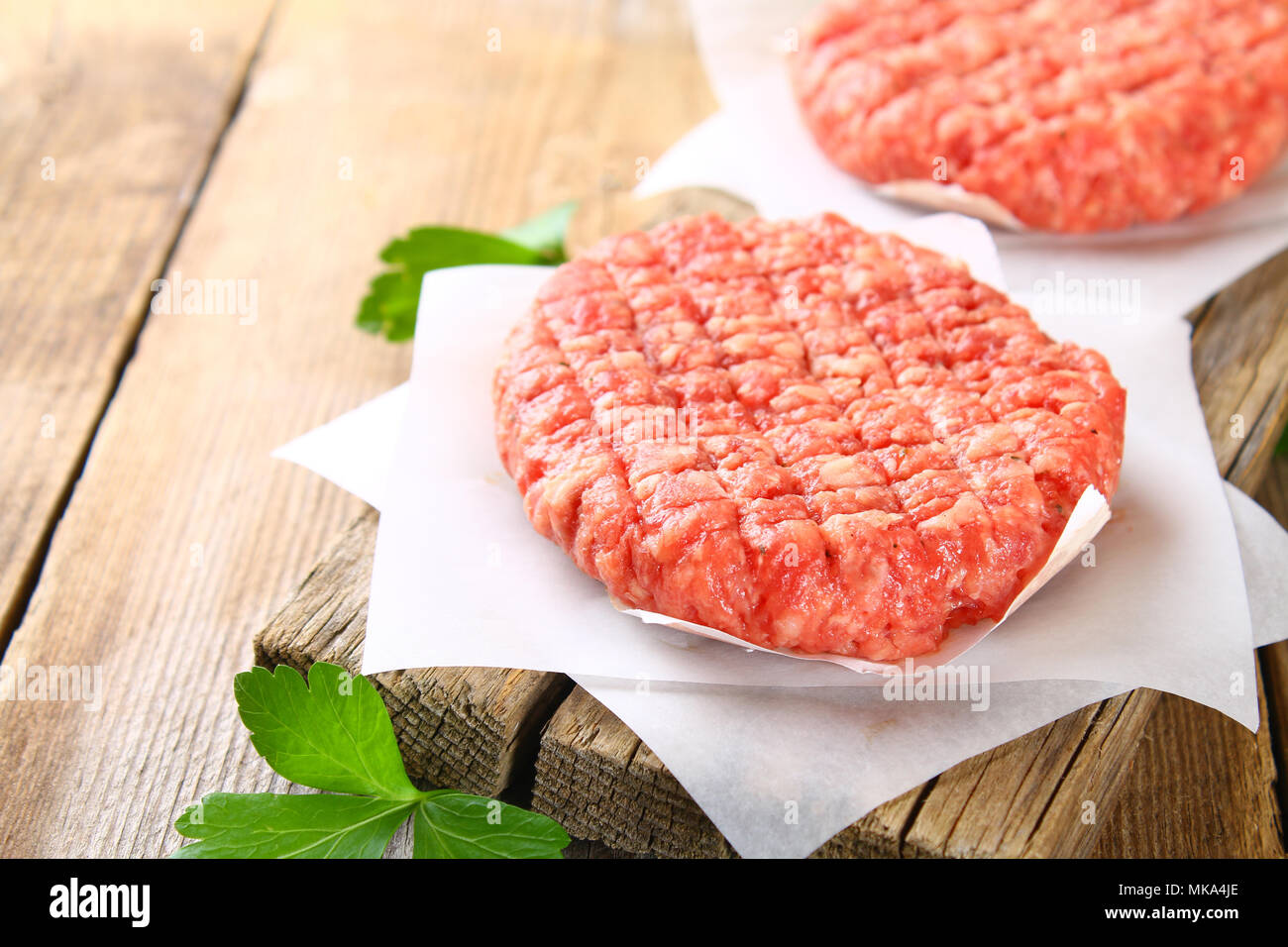 Raw minced meat for home made grill burgers cooking with spaces and ...