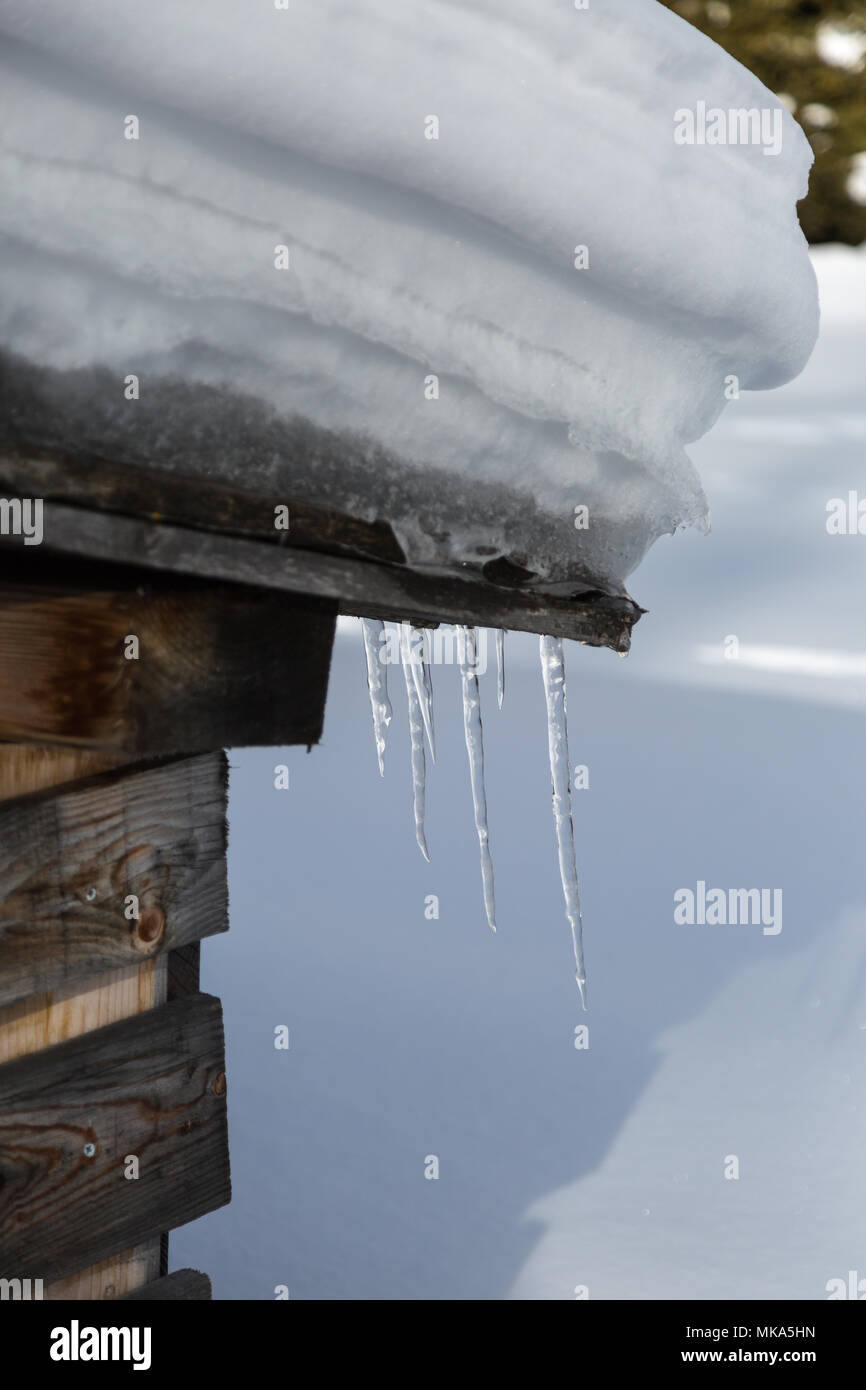 Ice Dams on Wooden Roof during Snowy Winter Stock Photo - Alamy