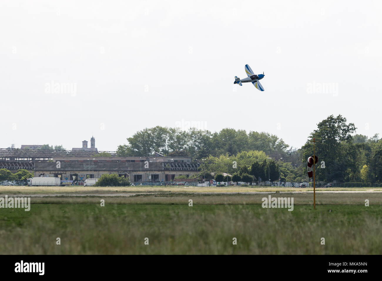 Small and Light Piper Aircraft against Blue Sky near Runway Stock Photo ...