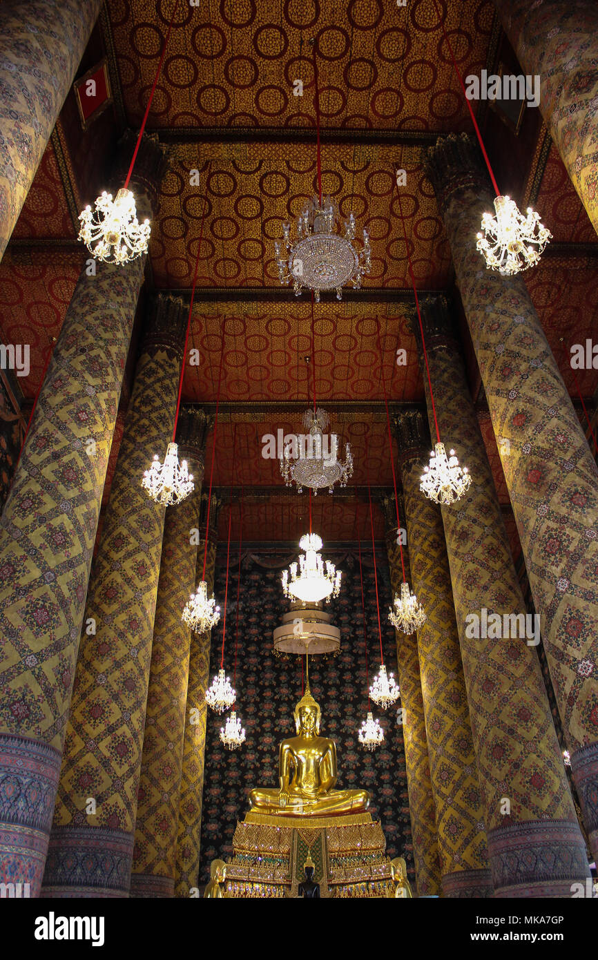 Patterned walls and beautiful Buddha inside the temple Stock Photo - Alamy