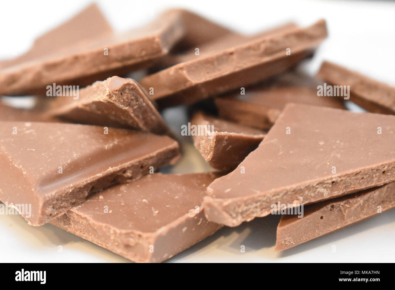 Pile of Milk Chocolate Triangles Stock Photo - Alamy
