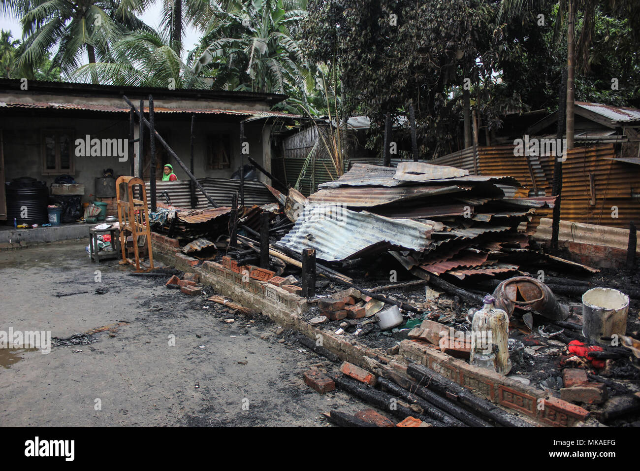 Guwahati, Assam, India. 7th March 2018. A house catch fire and gas ...