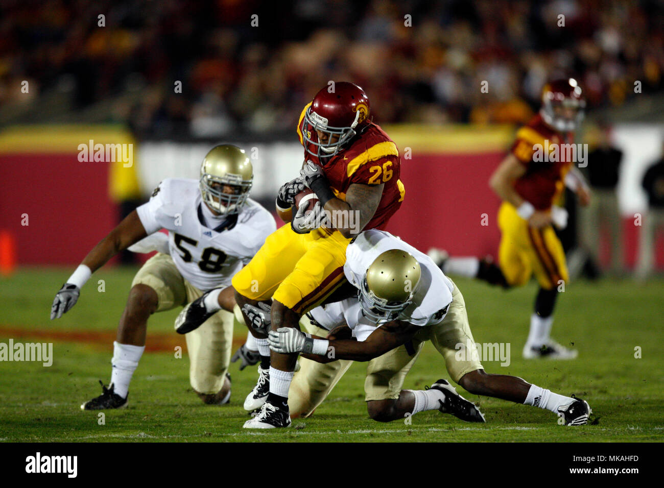 Marc Tyler #26 of the USC Trojans carries the ball against the Notre ...