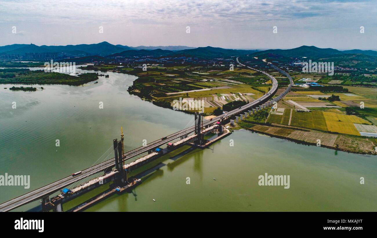 Xiangyang, China's Hubei Province. 7th May, 2018. The Hanjiang Bridge ...