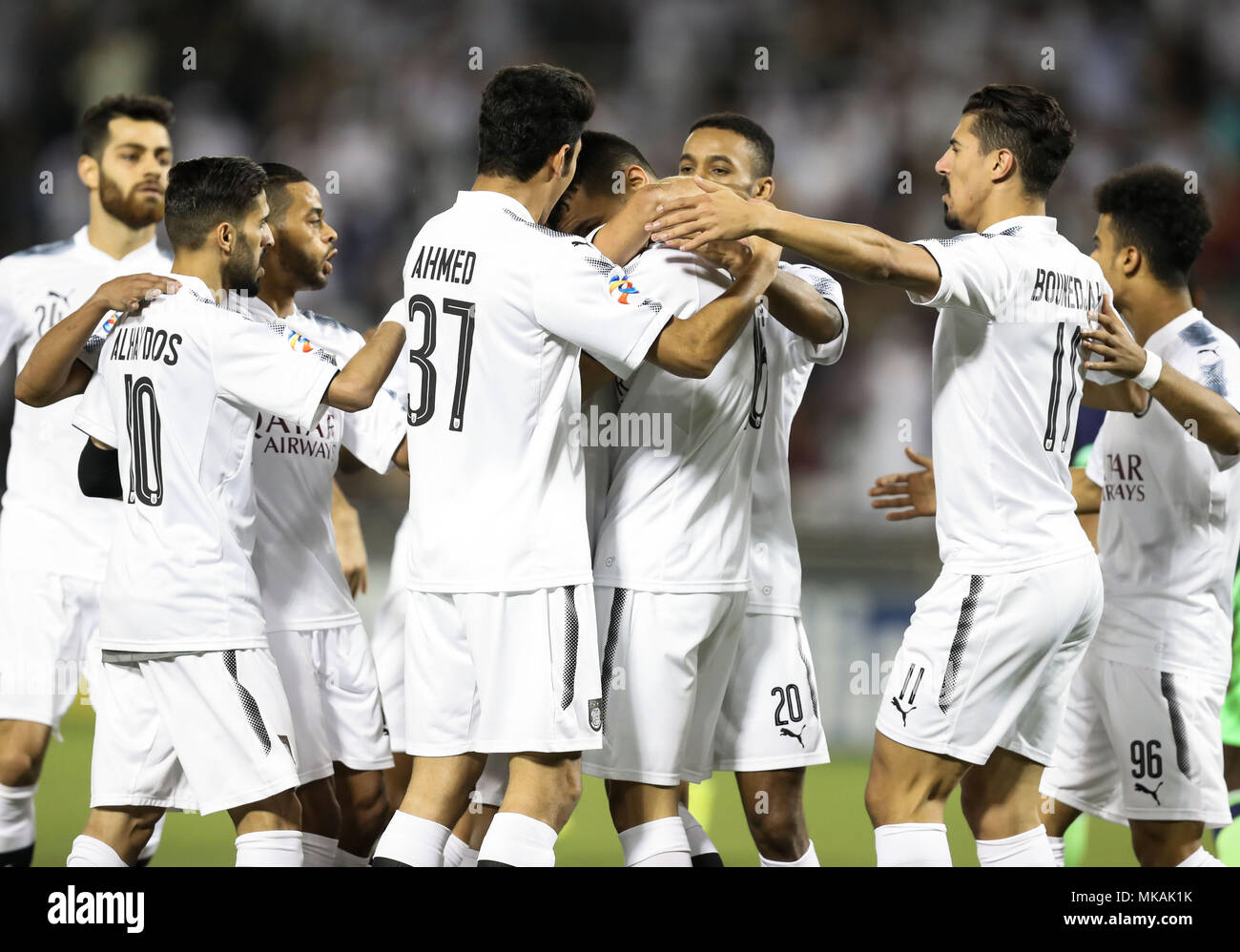 Doha, Qatar. 7th May, 2018. Players of Al Sadd SC celebrate a goal ...