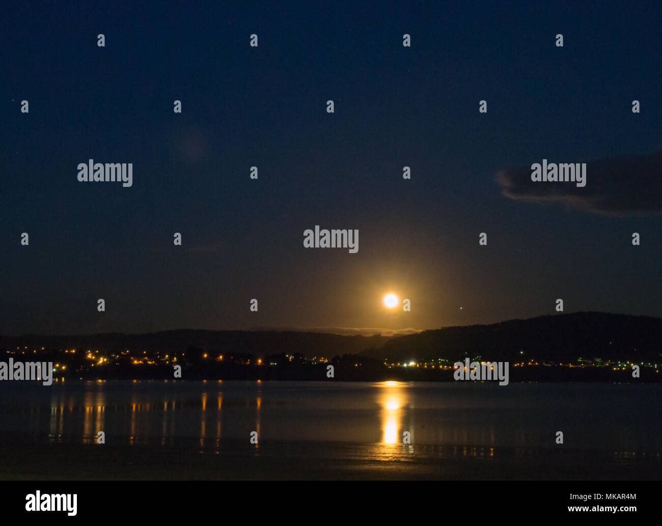 Moon over the sea in the night Stock Photo - Alamy
