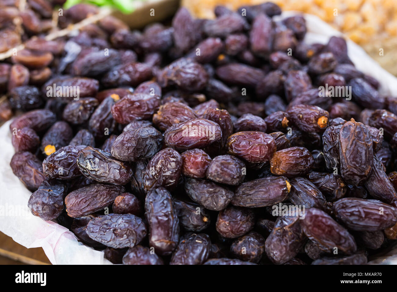 Fresh dates in a market - healthy lifestyle, food and fruit concept ...
