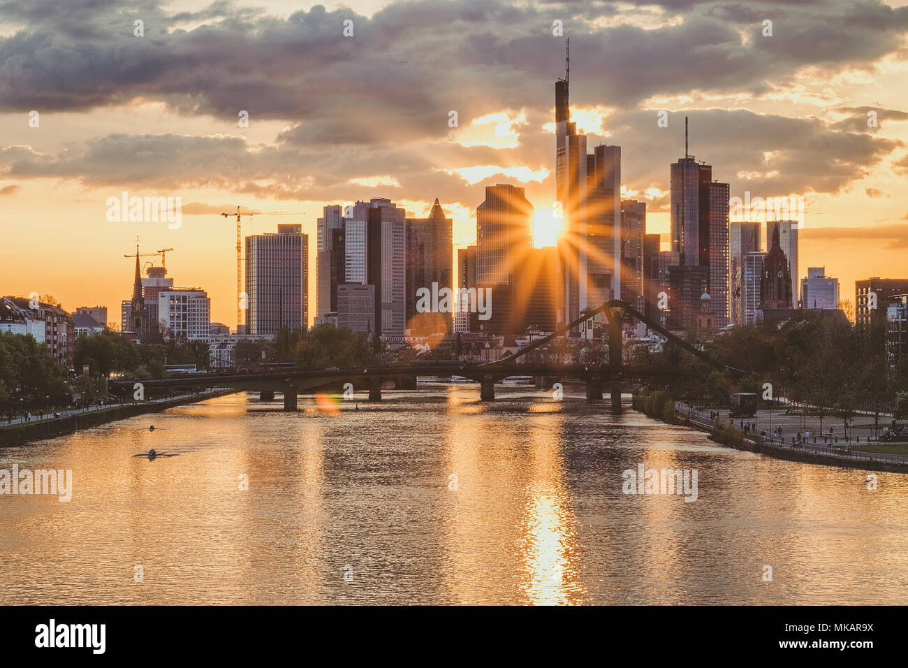 Sun between frankfurt skyline skyscraper hi-res stock photography and ...