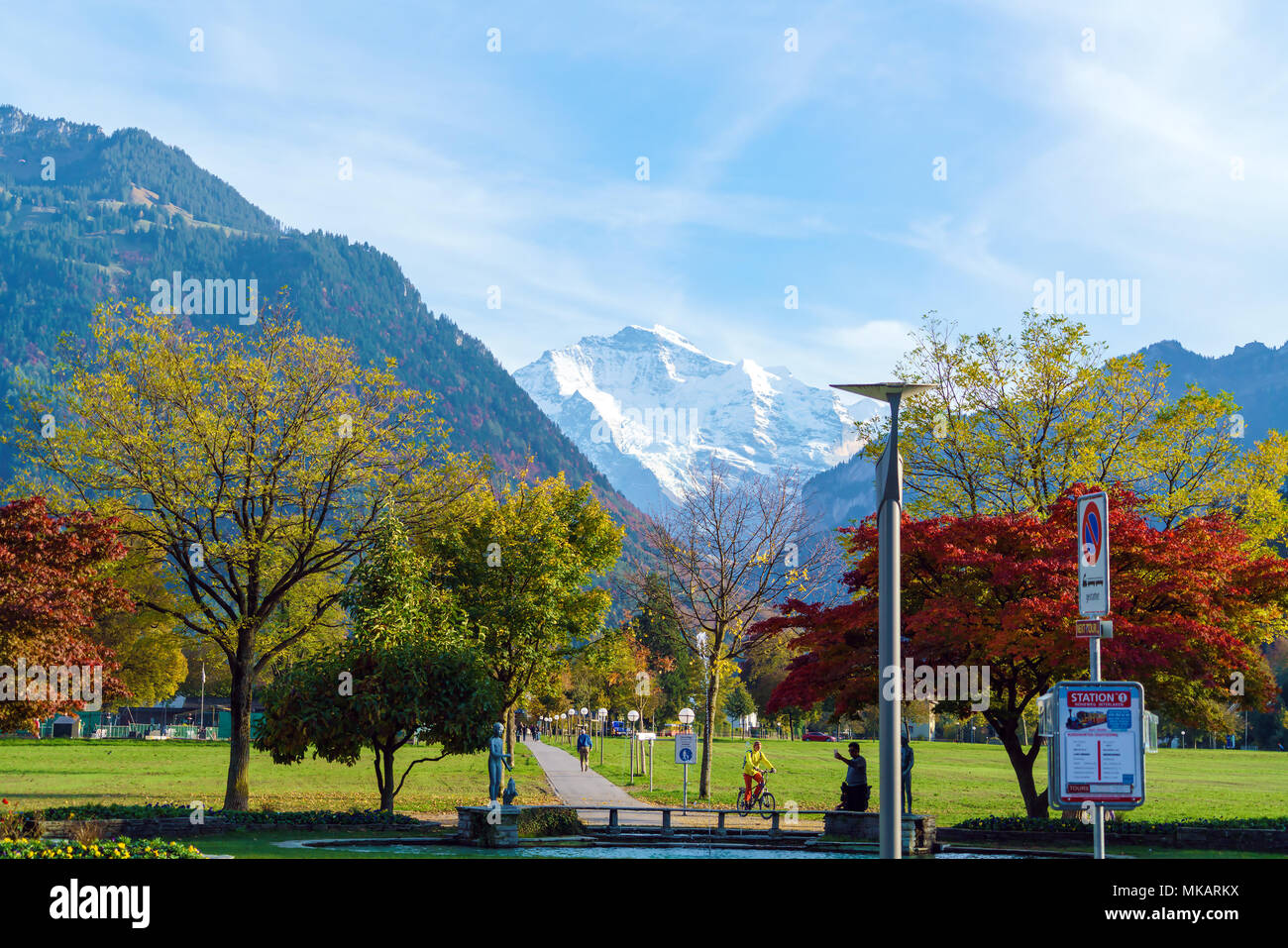 Interlaken, Switzerland - October 17, 2017: Cyclist in the city park ...