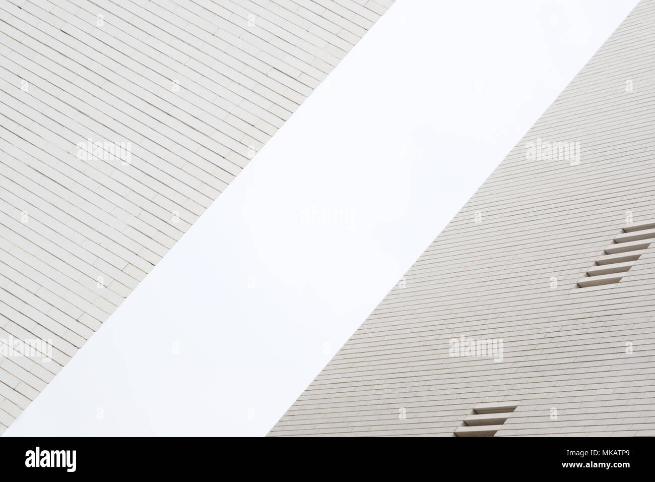 White brick building background. Abstract architecture and empty copy ...
