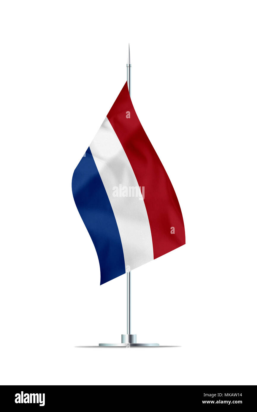 Small Dutch flag on a metal pole. The flag has nicely detailed textile ...