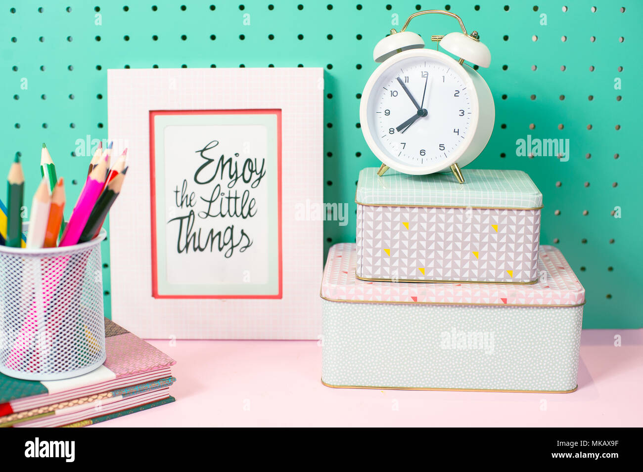 Back to school supplies pastel workspace with alarm clock, storage ...